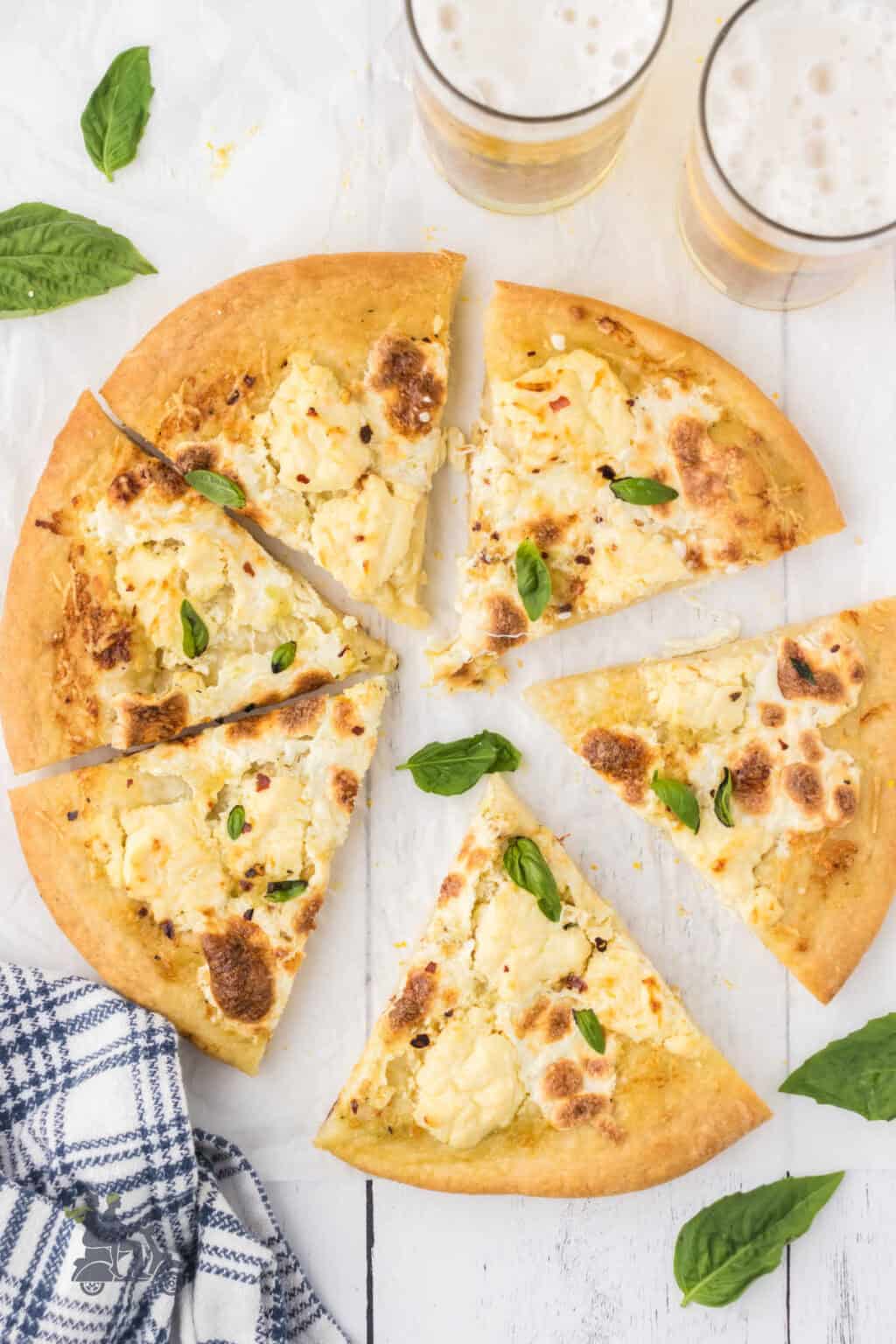 Elevate Pizza Night With A Three Cheese Gourmet White Pizza