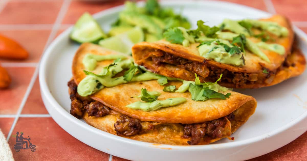 Easy Crispy Oven-Baked Beef Tacos with Creamy Lime Sauce